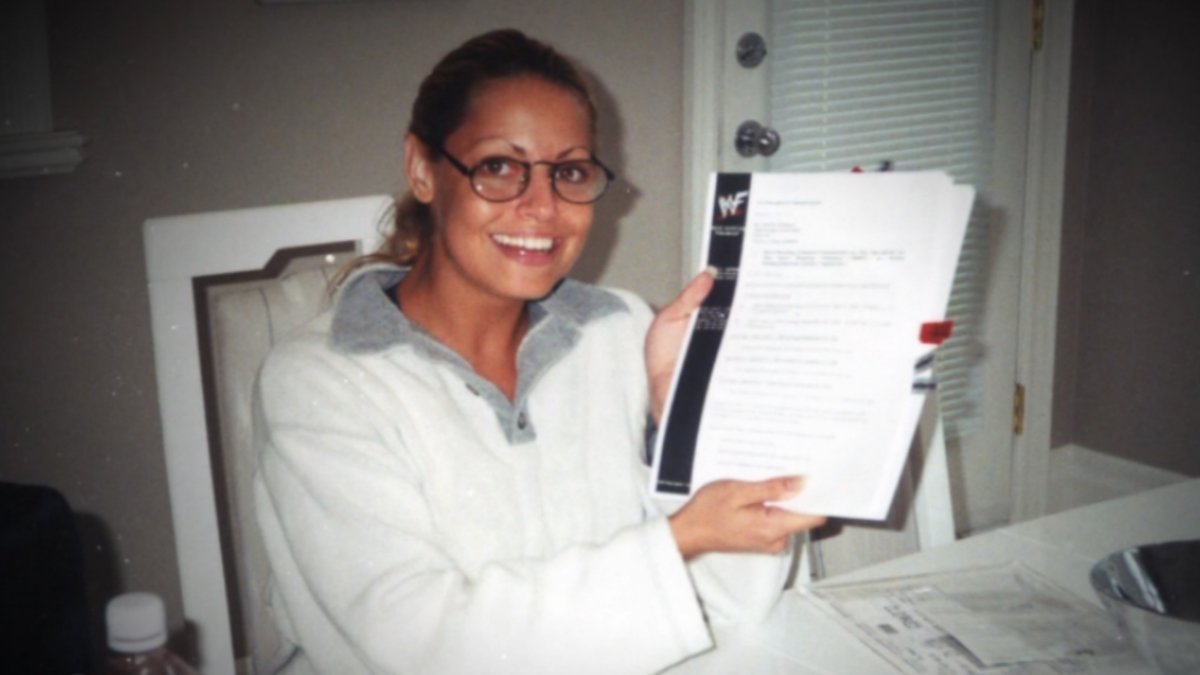 Rare Pic Of Trish Stratus Signing Her First WWE Contract